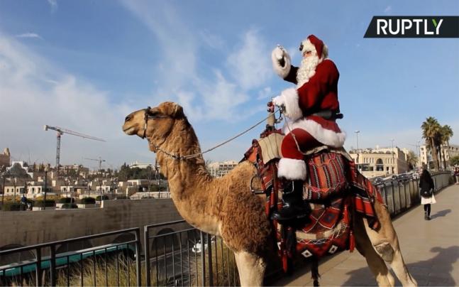 Watch East Jerusalem's Santa Take a Ride on Rudolph the Red-Nosed Camel ...