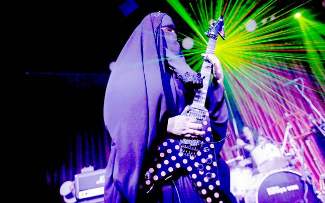 Out from the shadows: Burqa-clad woman plays heavy metal; impresses ...