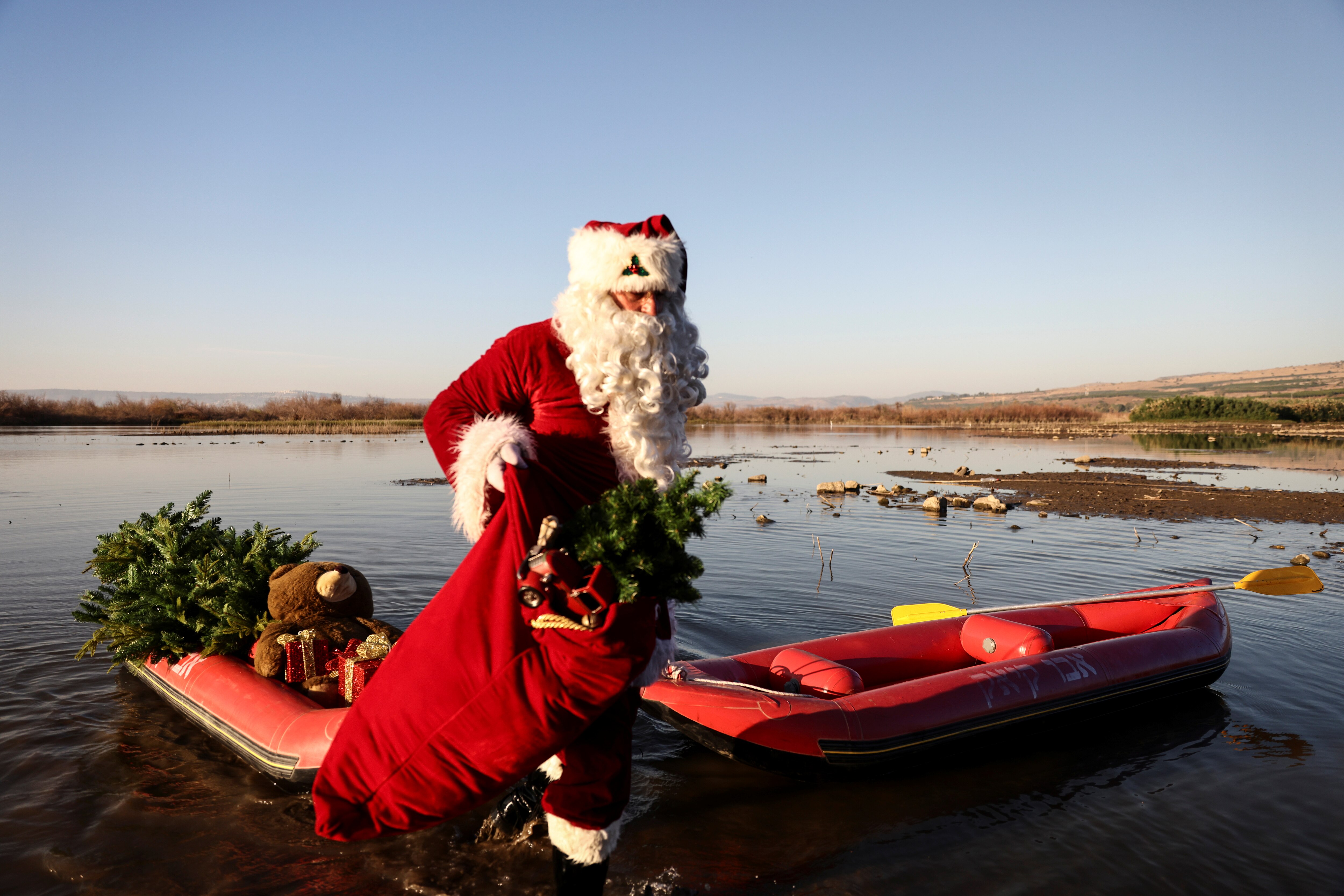 Santa on the sea: Christmas cheer in Jerusalem as gifts arrive early ...
