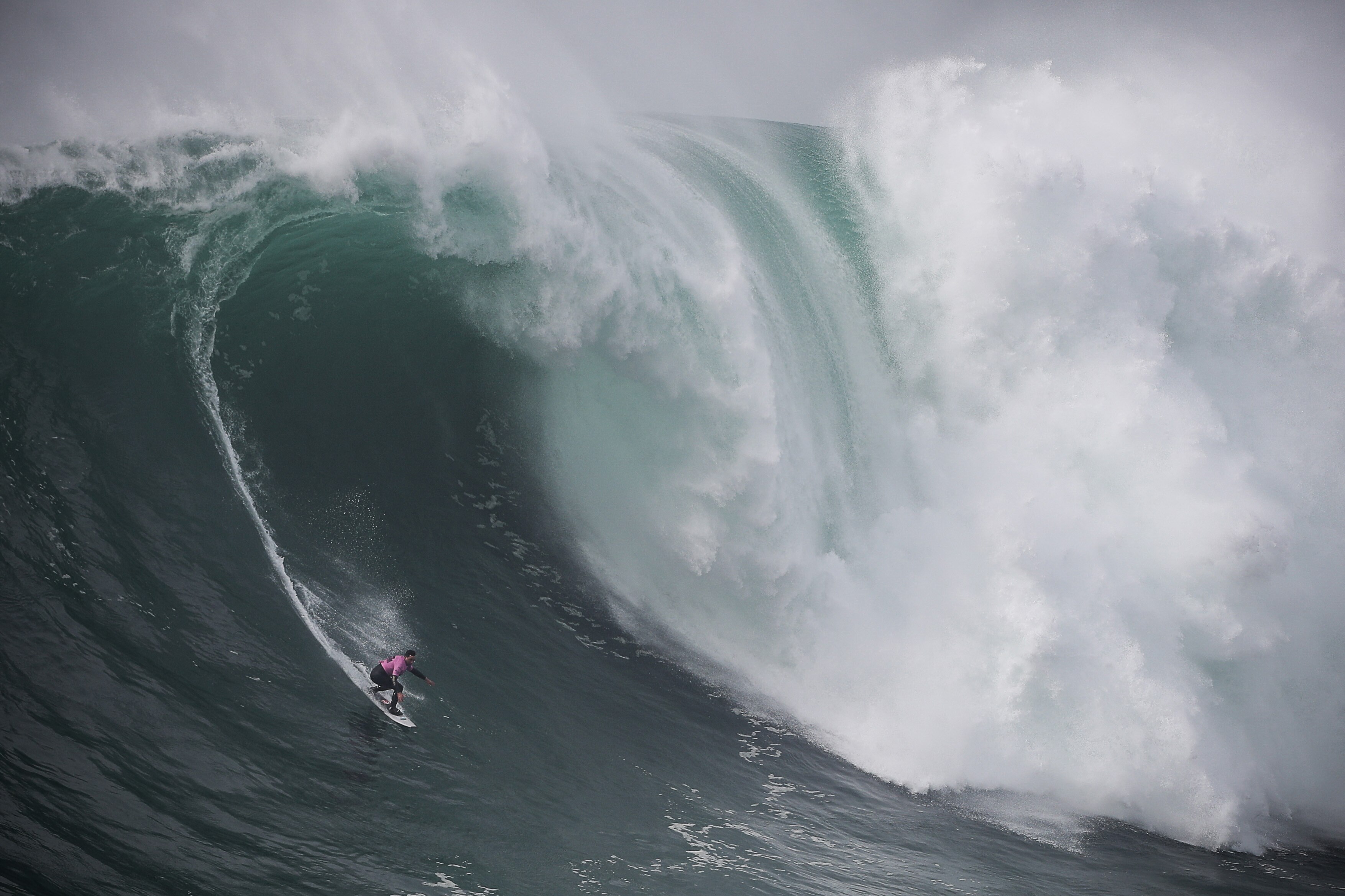 World’s best surfers take on giant waves during Nazaré Tow Surfing ...