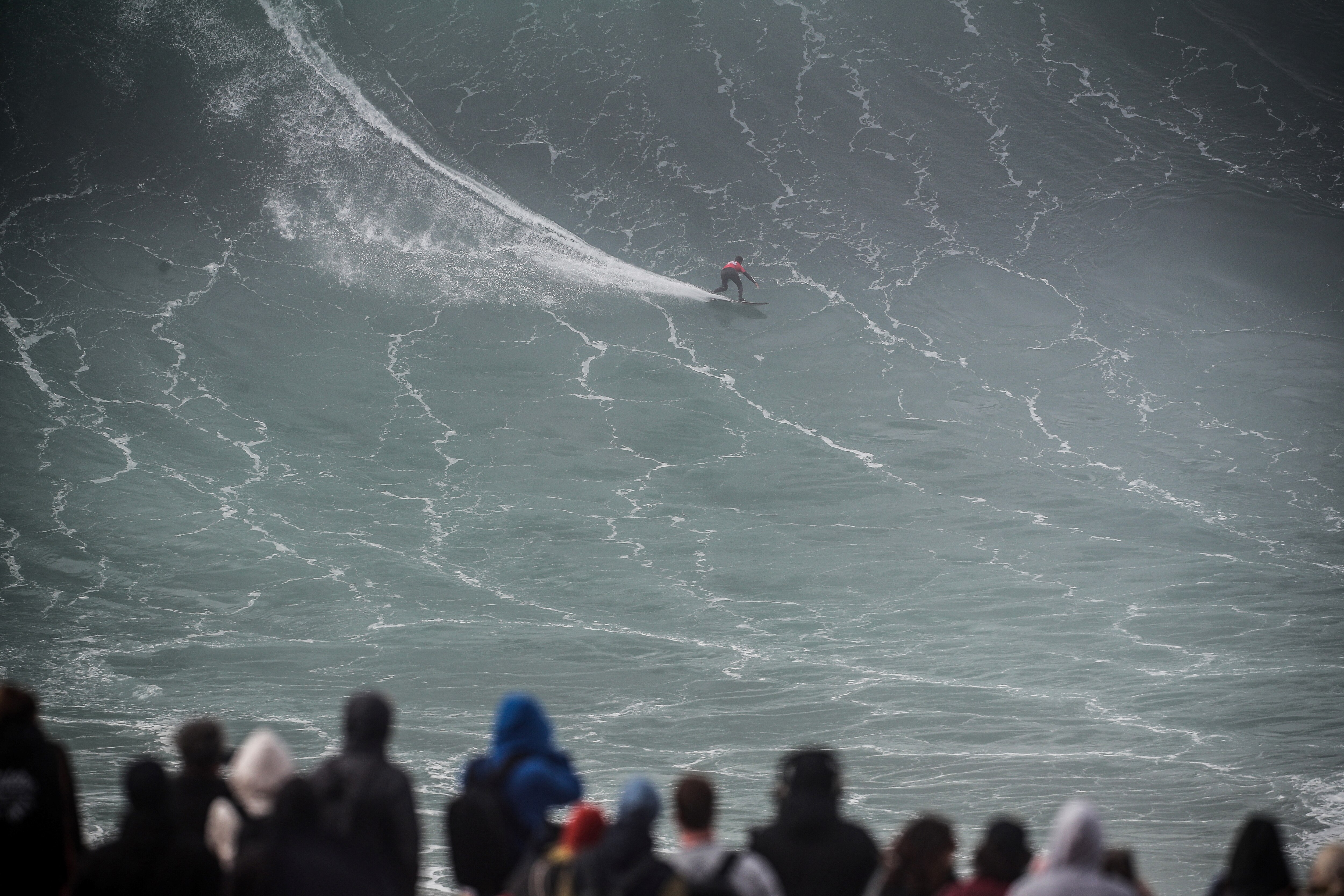 World’s best surfers take on giant waves during Nazaré Tow Surfing ...