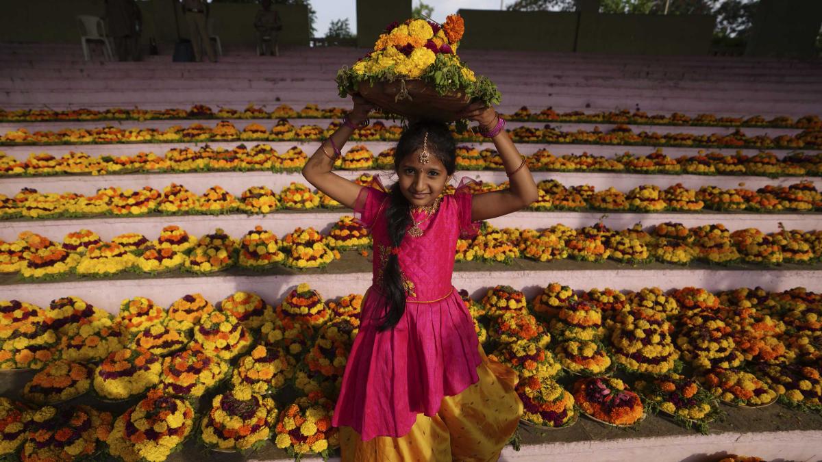Telangana celebrates flower festival 'Bathukamma' with pomp and show | Pics