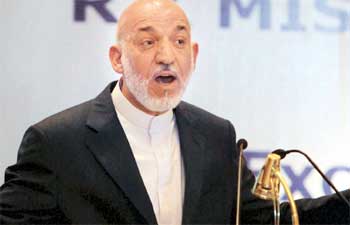 Karzai plays balancing game with Pak - India Today