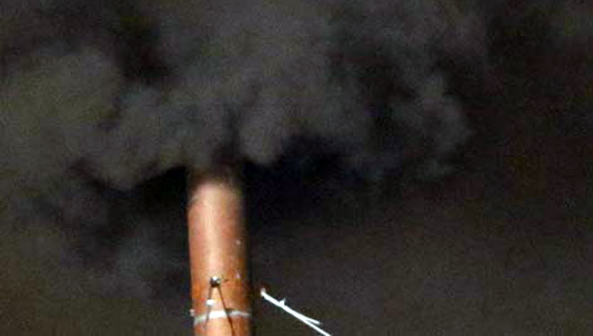 At Vatican, black smoke signals Pope not elected on first day of ...
