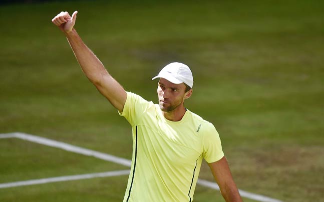 Karlovic hits record 45 aces, Federer through to Halle semis - Sports News