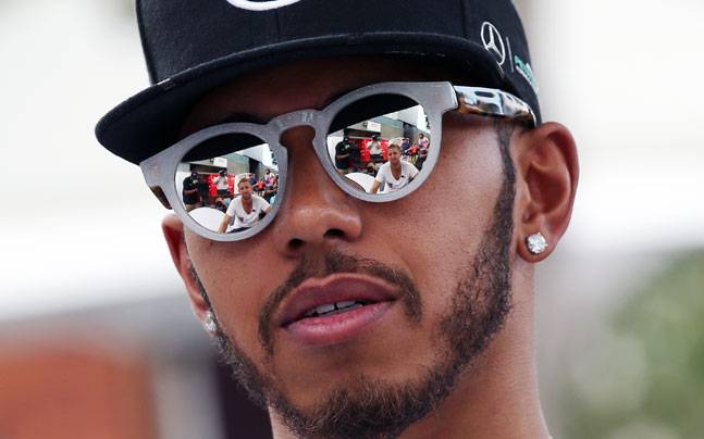 Lewis Hamilton fastest in wet opening practice at Australian GP - India ...