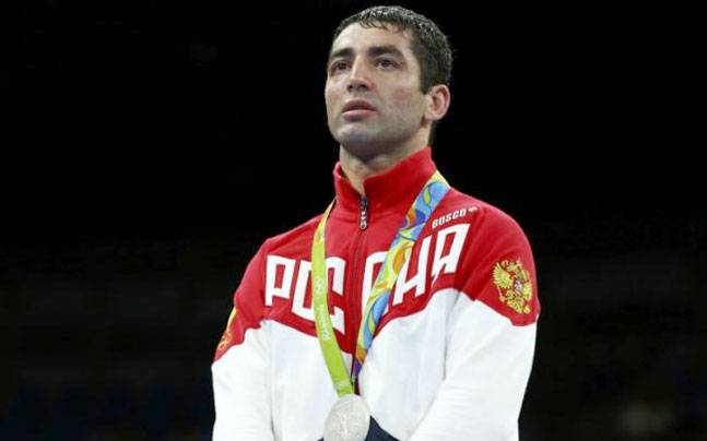 Russian boxer, Romanian weightlifter lose Rio medals after failing ...