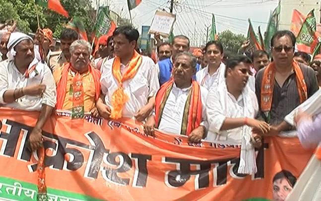 BJP takes out 'Aakrosh march' to protest 64 per cent students failing ...