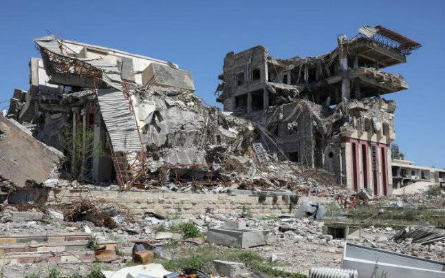 Books come in from across the world to help rebuild Mosul library ...