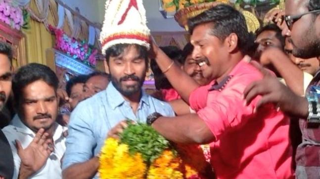 SEE: Dhanush at his fan's wedding. Don't miss what he gifted the newlyweds