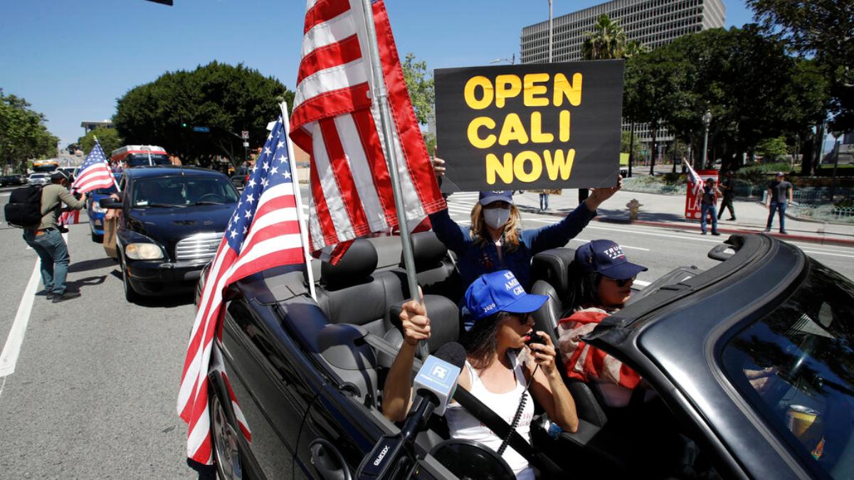 White House shifts from raising alarms to reopening country