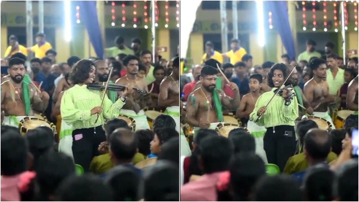 Woman plays soothing violin with 'chenda melam' at temple festival in ...