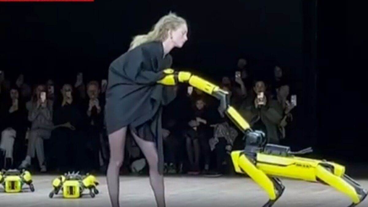 Watch: Robots steal the fashion show as they walk with models in Paris ...