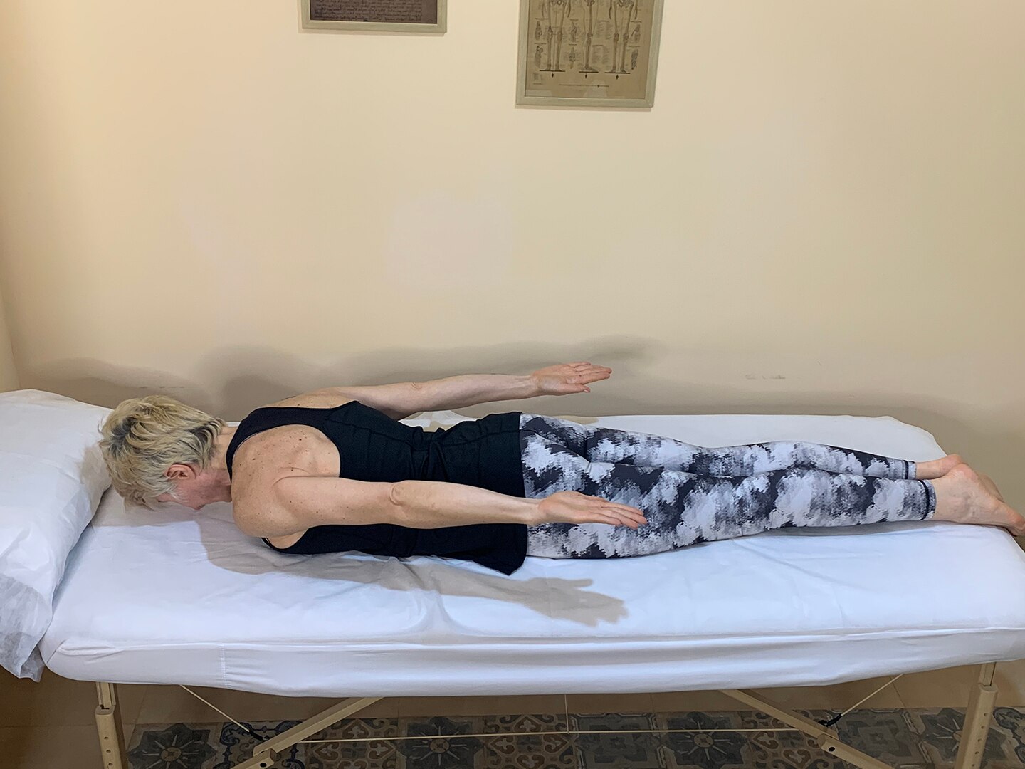 5 Exercises You Can Do From Your Bed to Ease Back Pain - Features