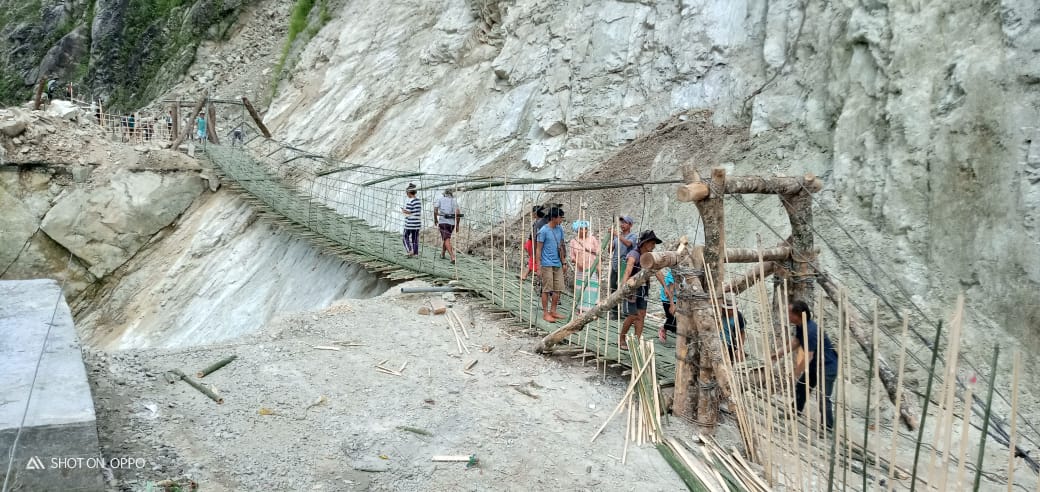 Arunachal Villagers build wire rope suspension bridge against road ...