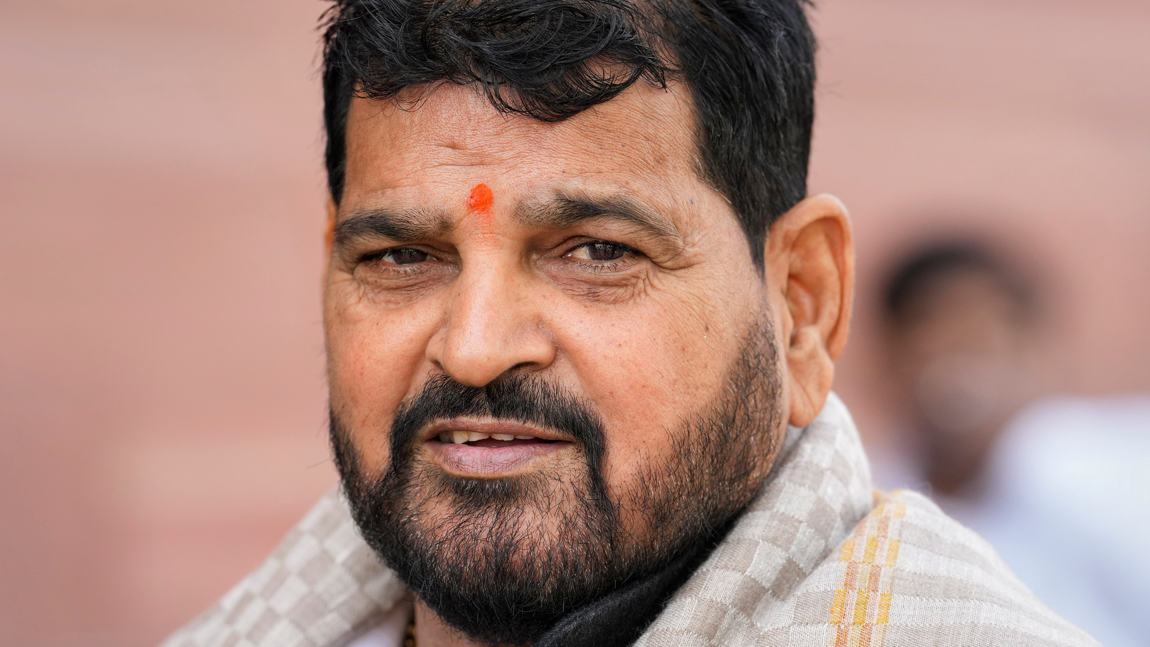 Why has WFI Chief Brij Bhushan Singh not been arrested despite being booked under POCSO?