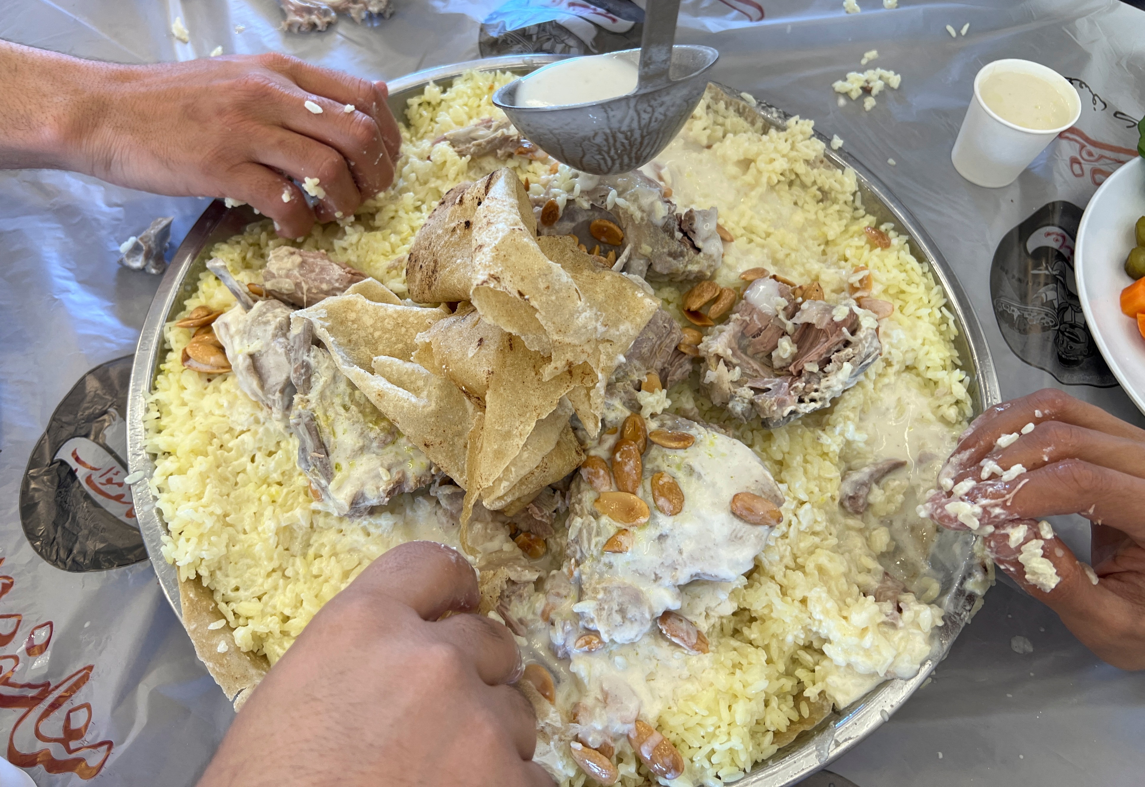 At this restaurant in Jordan, you can eat the national dish and take a nap