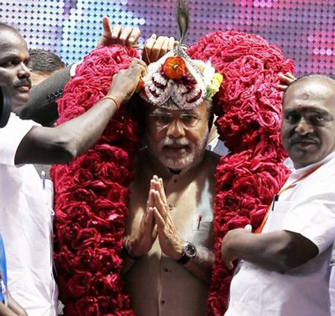 Oh god! Modi gets his fashion sense from Almighty?