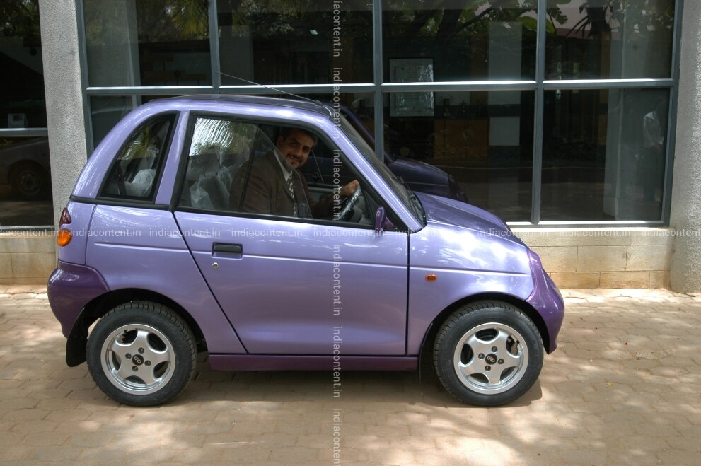 Buy CHETAN MAINI WITH REVA CAR Pictures, Images, Photos By DEEPAK G ...