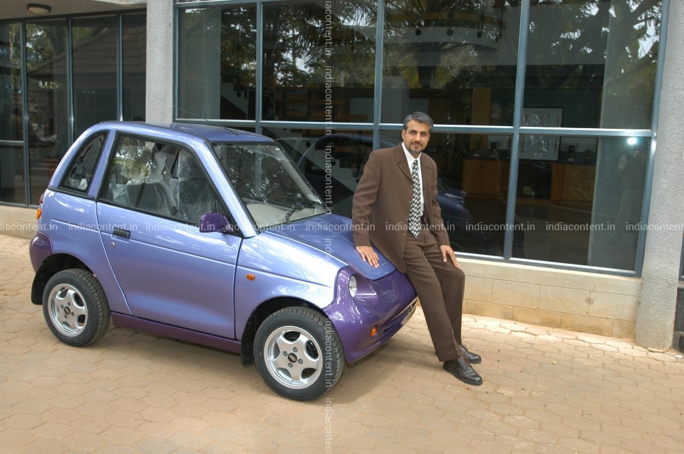 Buy CHETAN MAINI WITH REVA CAR Pictures, Images, Photos By DEEPAK G ...