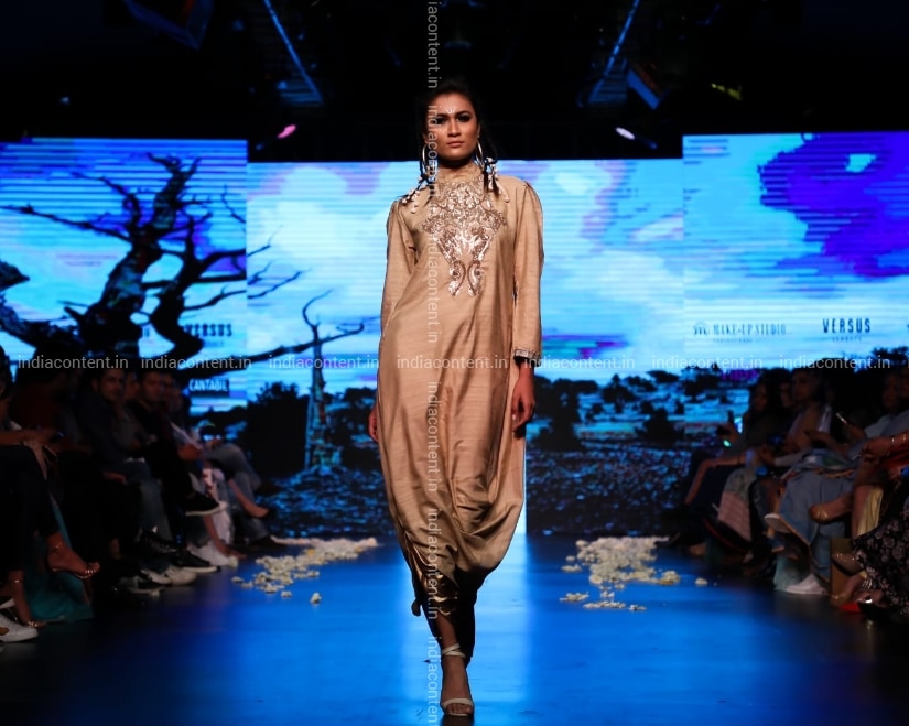 Buy New Delhi A model showcasing the creations of fashion designer Rina ...