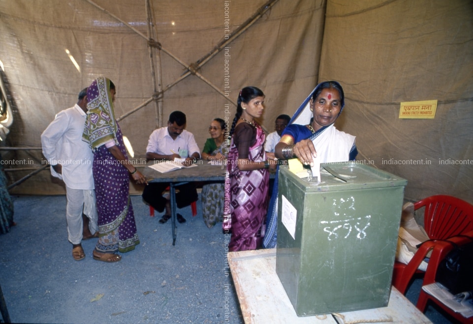 Buy WOMEN VOTING IN POLL BOOTH Pictures, Images, Photos By Hemant Pithwa - Archival pictures