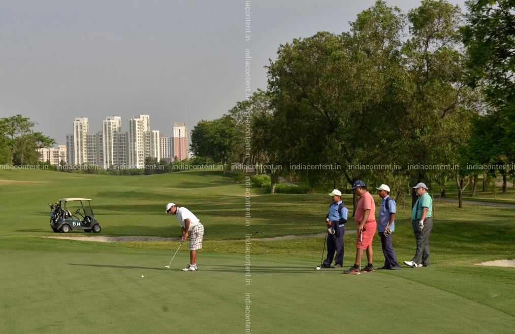 Buy People playing golf at Jaypee Golf Course Pictures, Images, Photos ...