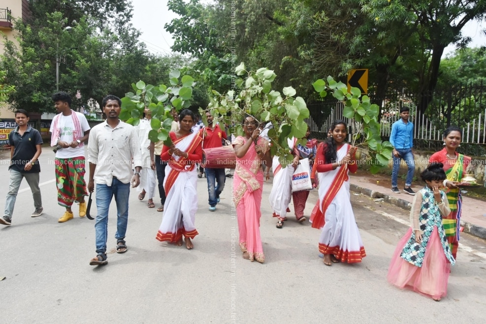 Buy Ranchi Tribals carrying branches of Karam tree proceed to perform ...