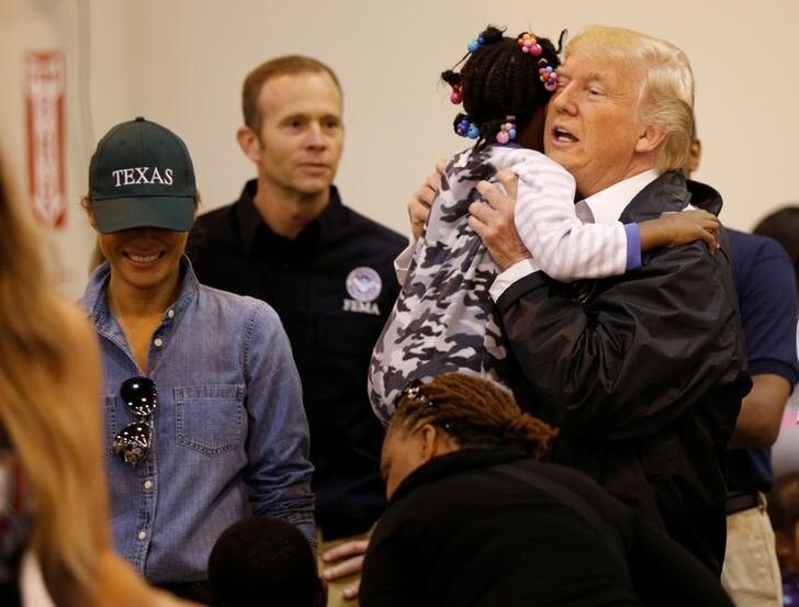 Hurricane Harvey IN PICS: Donald Trump hugs children, serves food in ...