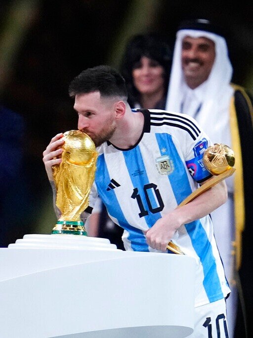 Messi kisses World Cup after realising dream