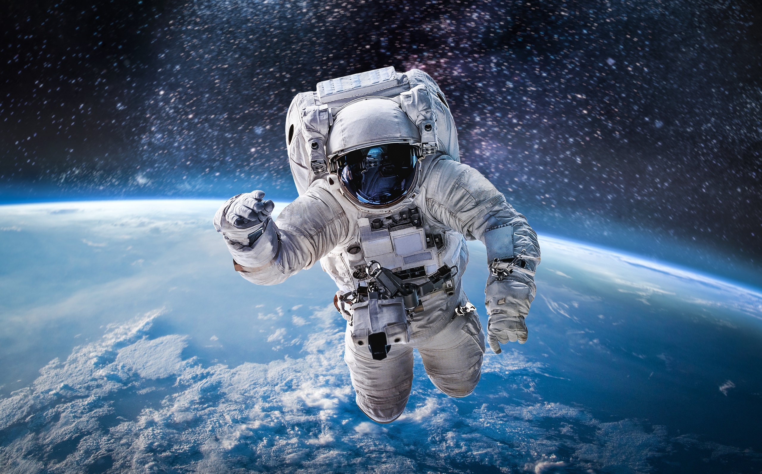 Why do astronauts in space age slower than people on Earth?